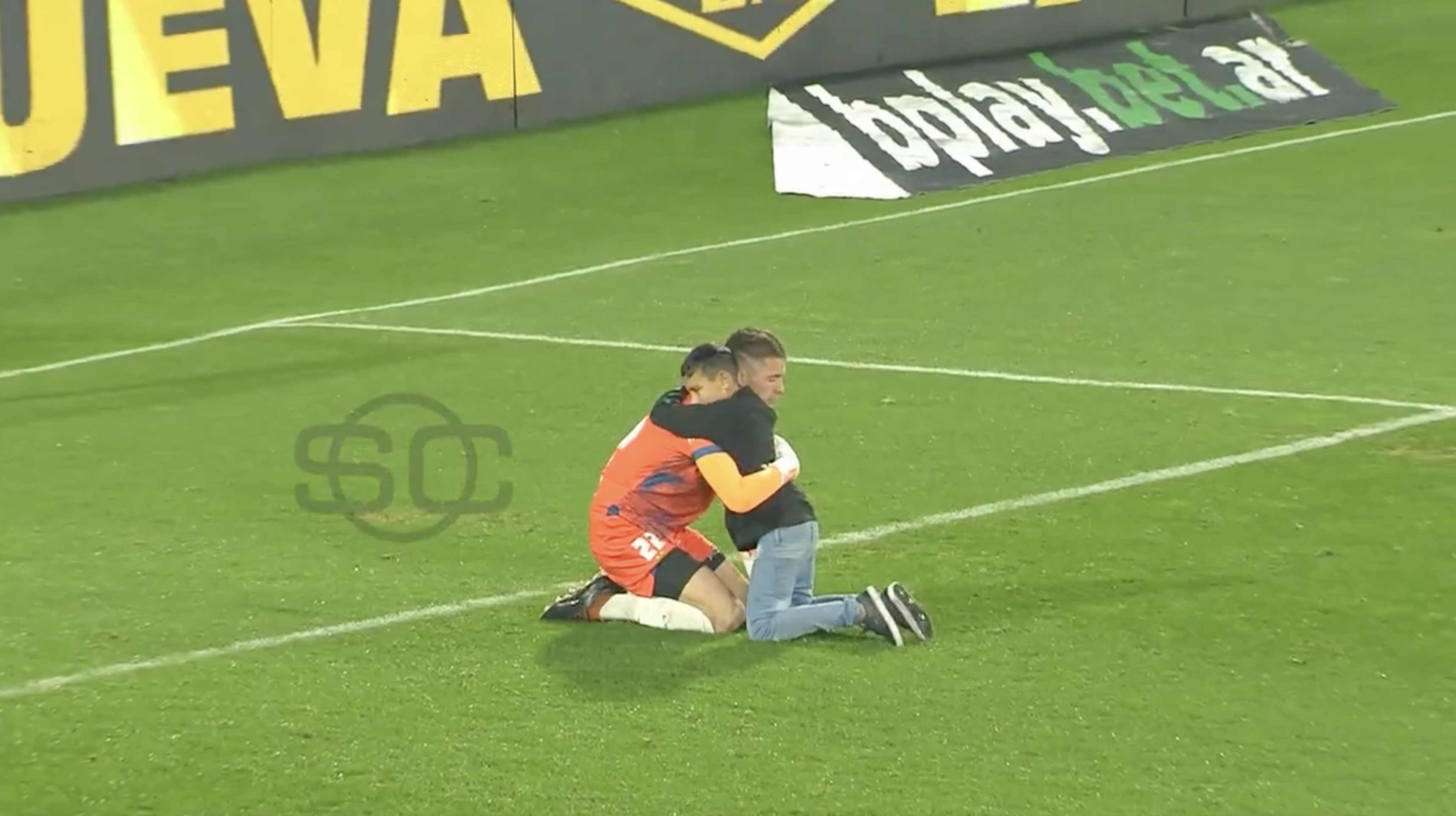 Child Invades Pitch To Console Defeated Goalkeeper | The18